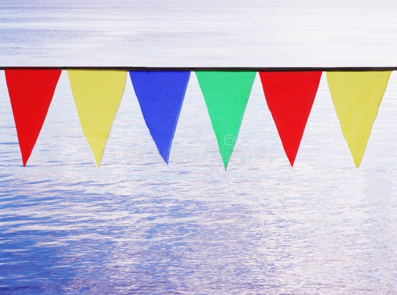 Multi Colored Triangular Flags Hanging in the Sky at an Outdoor Against ...