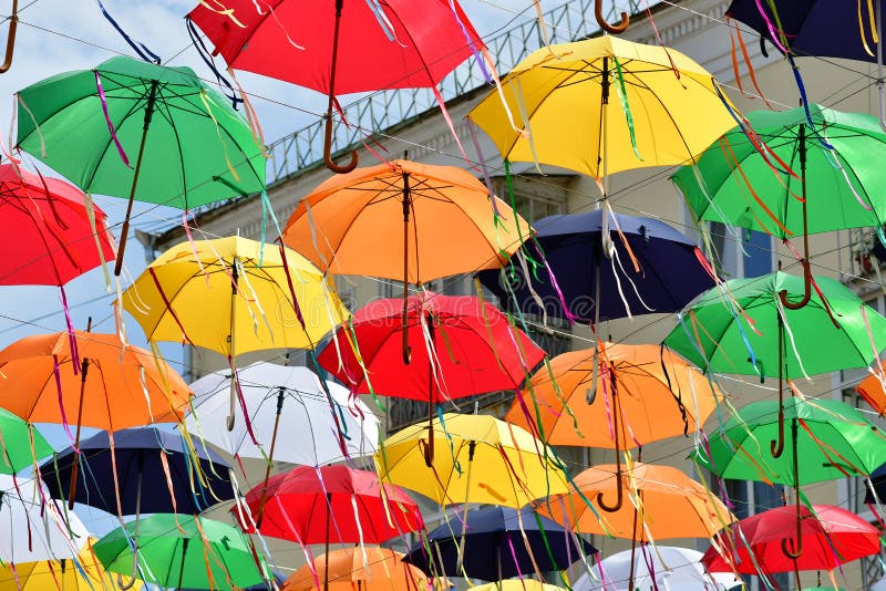 Multi-colored Umbrellas with Tapes Stock Photo - Image of slice, piece ...