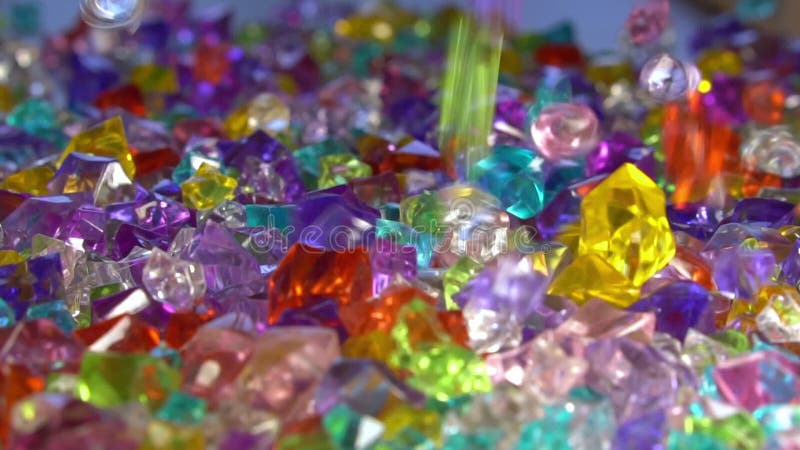Multi-colored Variety, Transparent, Colored, Plastic Pebbles Fall on ...