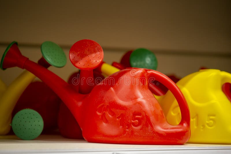 Multi-colored Watering Cans for Flowers Stock Image - Image of market ...