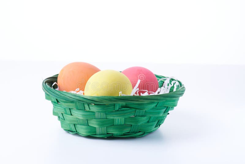 Multi Colors Easter Eggs in the Woven Basket Isolated on White ...