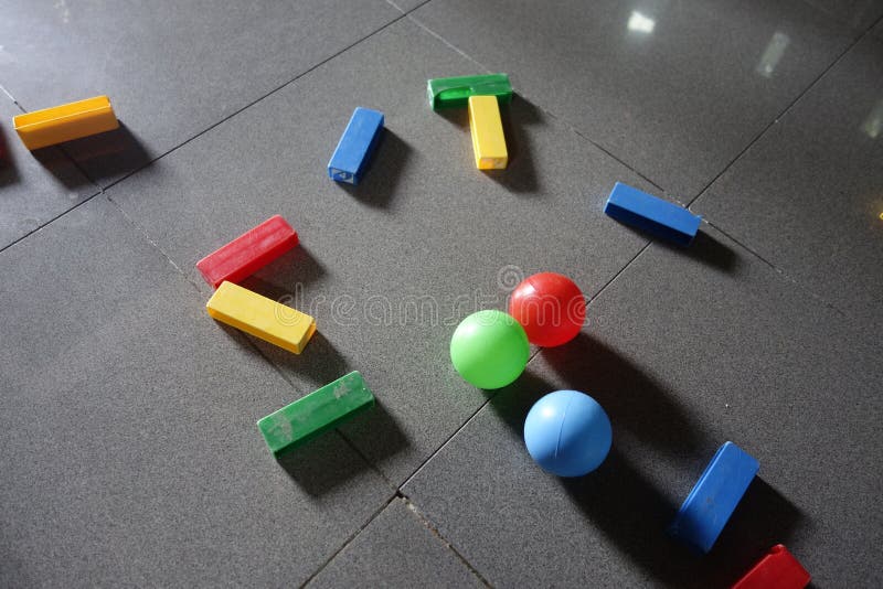 Multi Colour of Rectangular Bricks and Plastic Ball on the Floor Stock ...