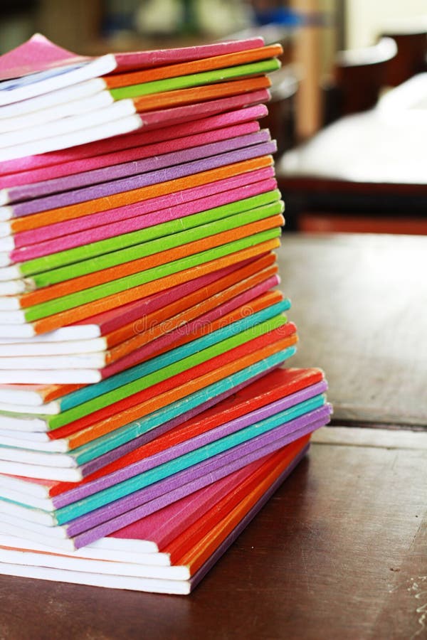 Row of coloured books stock image. Image of depth, documents - 11952955