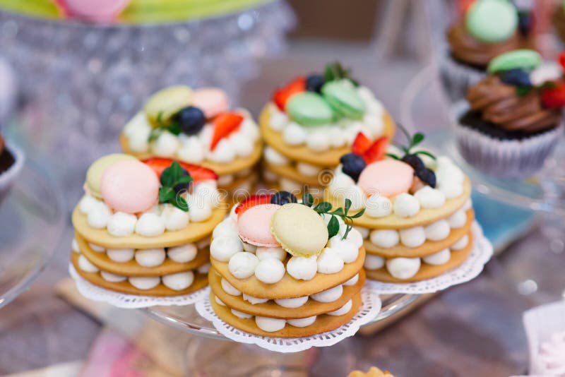 Multi-coloured Cakes in the Plate with Berries. Stock Image - Image of ...