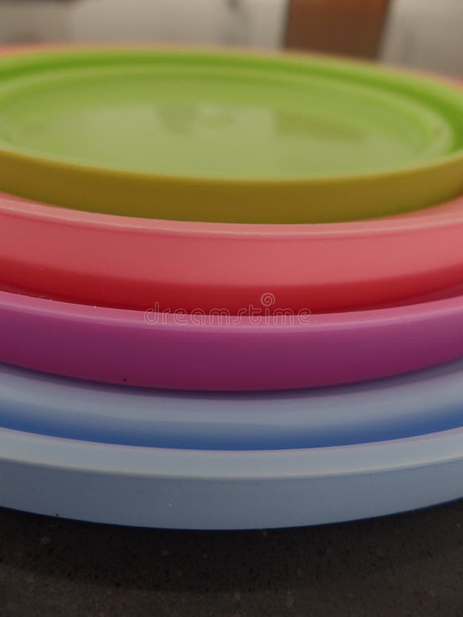 Multi Coloured Round Plastic Lids Stock Photo - Image of orderly ...
