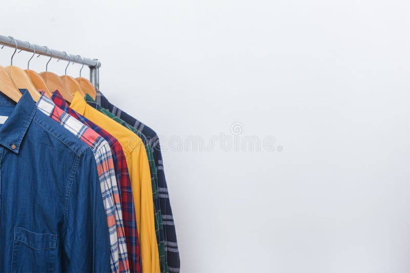 Multi-coloured Shirts on Wooden Clothes Hangers, White Background Stock ...