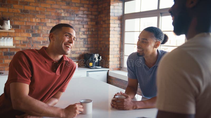 Multi-Cultural Businessmen Taking Coffee Break in Kitchen Area of ...