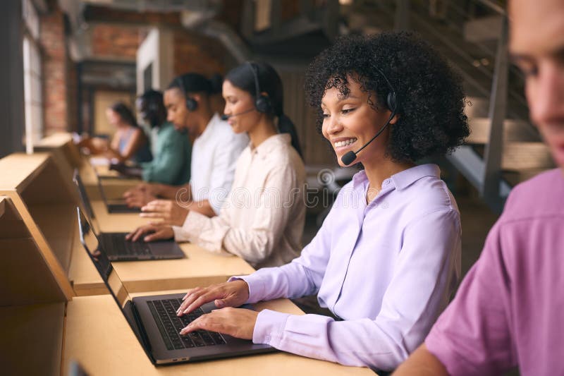 Multi-Cultural Customer Support or Telesales Team in Modern Open Plan ...