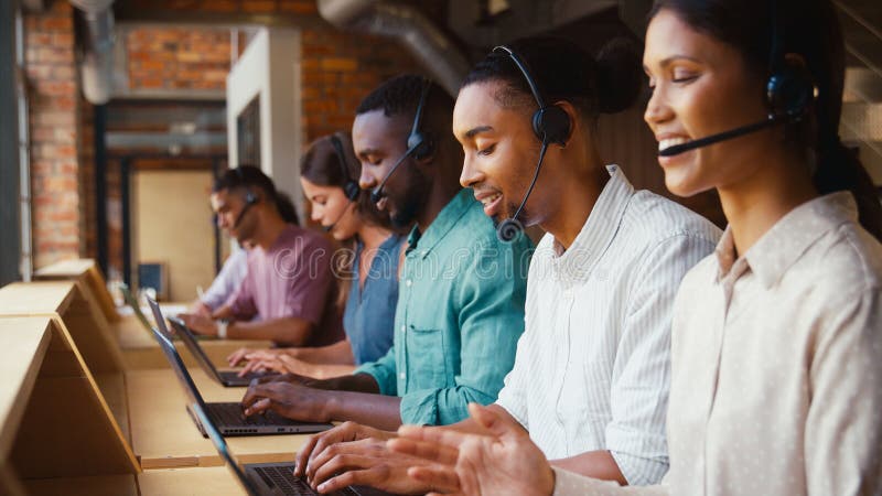 Multi-Cultural Customer Support or Telesales Team in Modern Open Plan ...