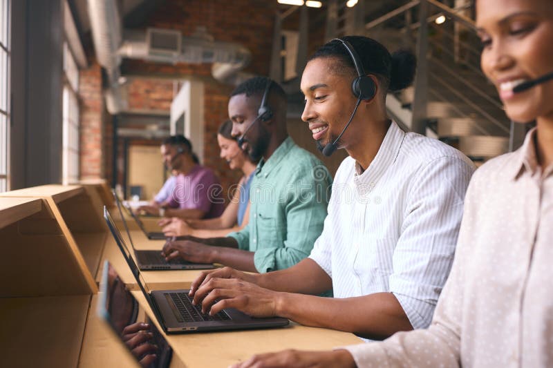 Multi-Cultural Customer Support or Telesales Team in Modern Open Plan ...