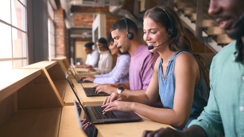 Multi-Cultural Customer Support or Telesales Team in Modern Open Plan ...