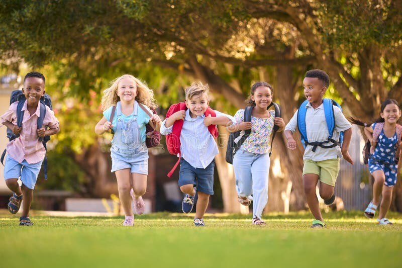 Multi-Cultural Primary or Elementary School Students with Backpacks ...