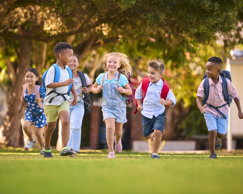 Multi-Cultural Primary or Elementary School Students with Backpacks ...