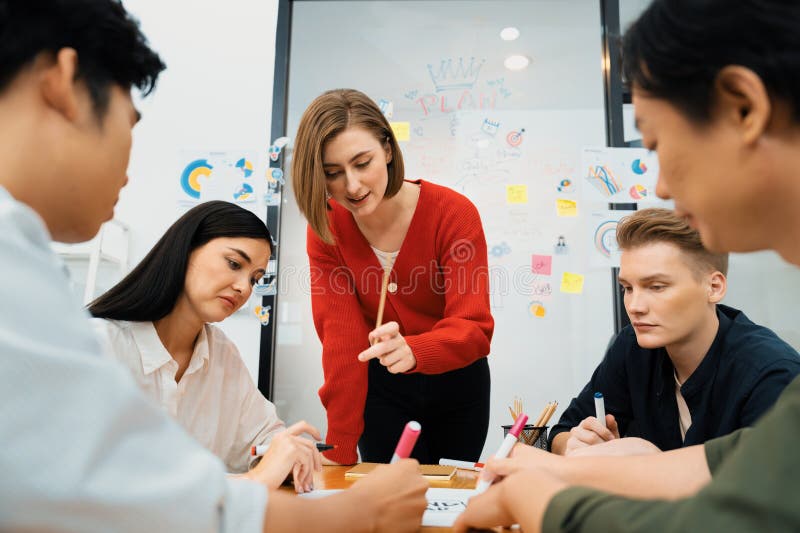 Multi-ethnic Business Group Brainstorming about Marketing Plan ...
