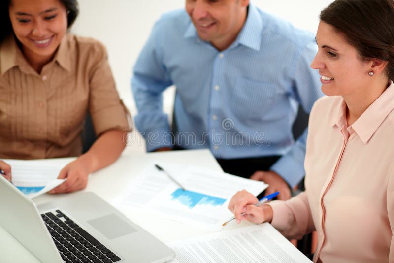 Multiracial Office Workers Working on Documents Stock Photo - Image of ...
