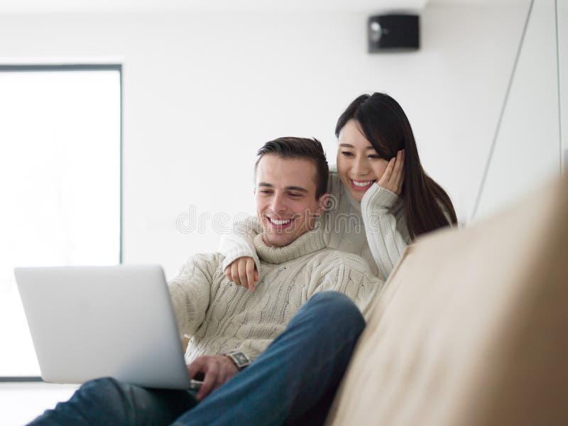 Multi Ethnic Couple Using Laptop Computers Stock Image - Image of ...