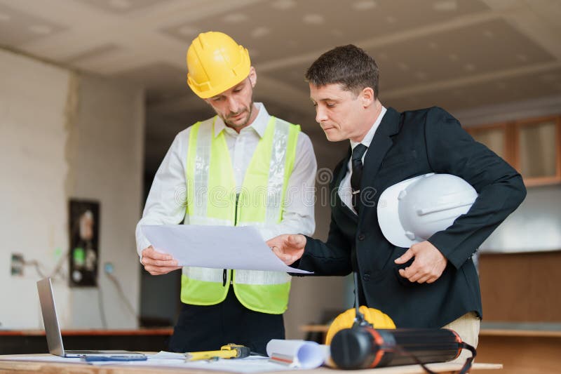 Multi Ethnic Engineer Brainstorming and Measuring for Cost Estimating ...