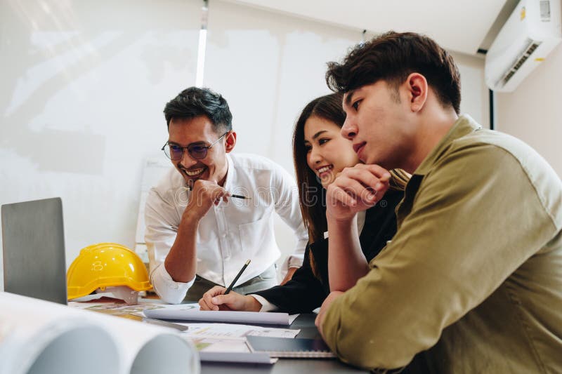 Multi Ethnic Engineer Brainstorming and Measuring for Cost Estimating ...