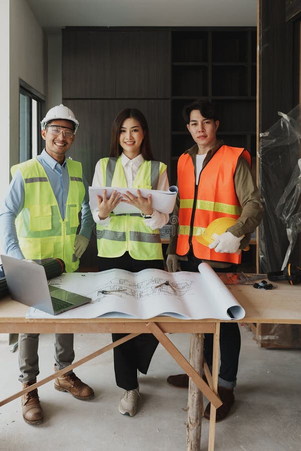 Multi Ethnic Engineer Brainstorming and Measuring for Cost Estimating ...