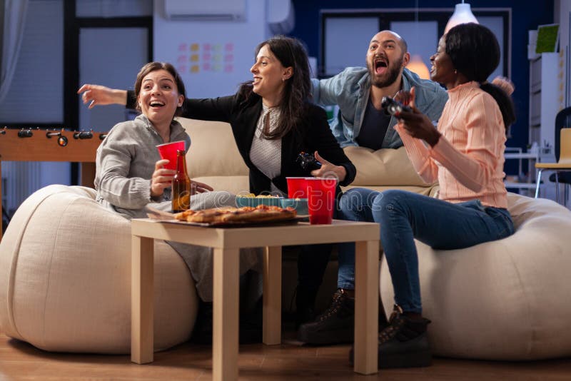 Multi Ethnic Friends Celebrate Together after Work at Office Stock ...