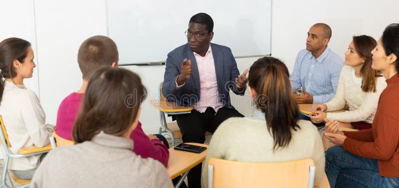 Multicultural People Meeting in Circle of Chairs Stock Photo - Image of ... Multicultural People Meeting in Circle of Chairs Stock Photo - Image of ...