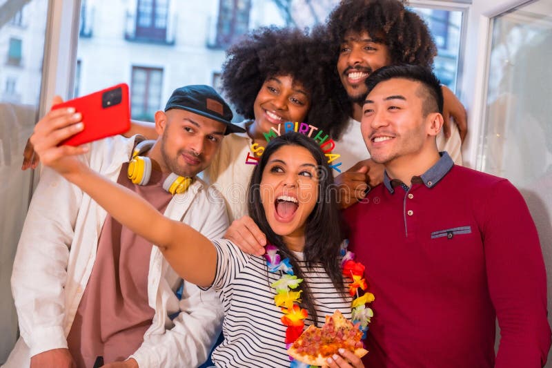 Multi-ethnic Group of Cheerful Friends Taking a Souvenir Selfie on the ... Multi-ethnic Group of Cheerful Friends Taking a Souvenir Selfie on the ...
