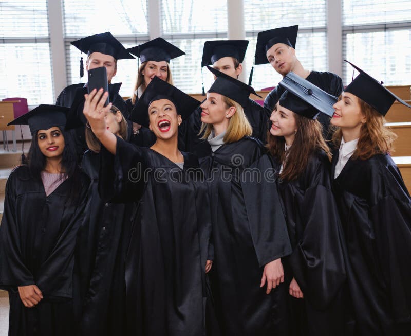 Multi Ethnic Group of Graduated Students Taking Selfie Stock Image ...