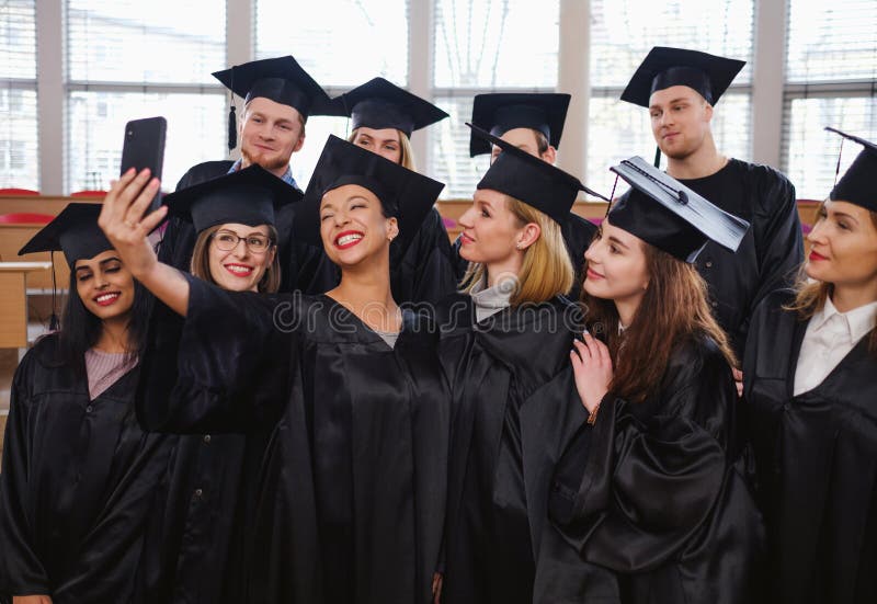 Multi Ethnic Group of Graduated Students Taking Selfie Stock Image ...