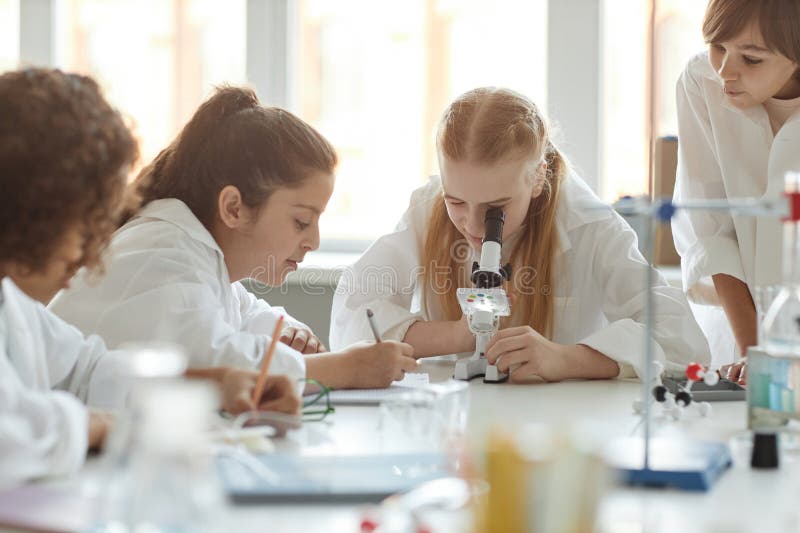 Group of Students Experimenting during Chemistry Class Stock Image ...