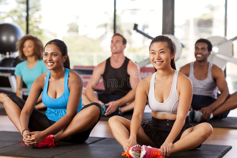 Multi-ethnic Group Stretching in a Gym Stock Image - Image of exercise ...