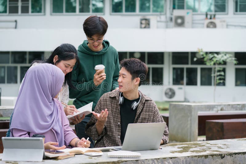 Multi Ethnic Group of University Students Brainstorming Together ...