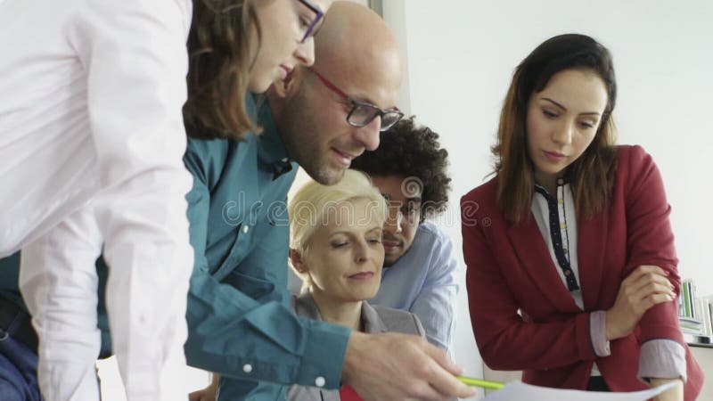 Multi Ethnic Group of Workers Working in a Call Center Office Stock ...