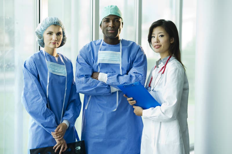 Multi-ethnic medical team stock image. Image of blue - 16904401