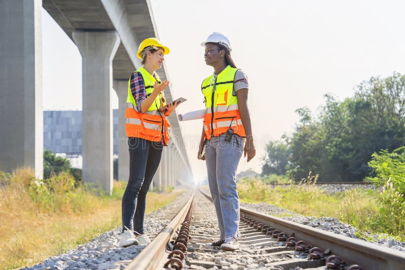 Multi Ethnic Railway Construction Workers Working Outdoors,standing at ...