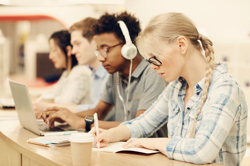 Multi-ethnic Students in Row Stock Photo - Image of studying, happiness ...