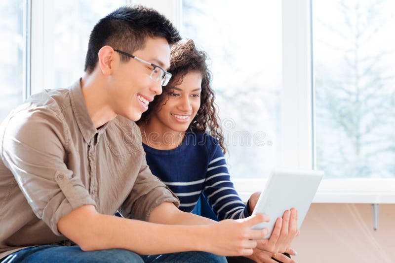 Multi Ethnic Students Using Tablet Computer Stock Image - Image of ...