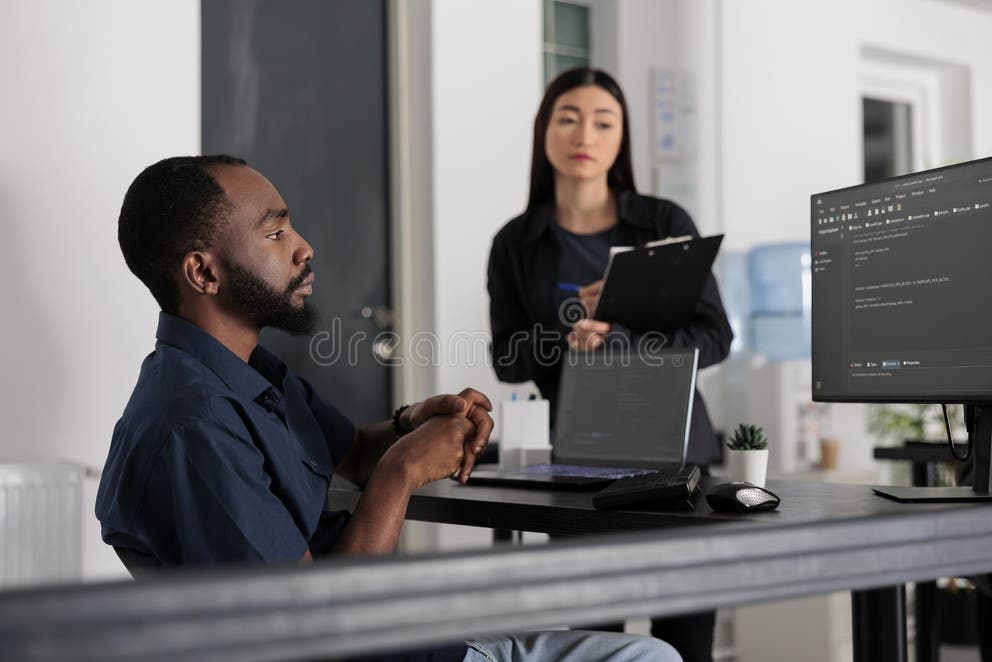 Multi Ethnic System Engineers Collaborating on Programming Project ...