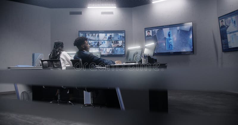 Security Officers Sit in Surveillance Room Stock Image - Image of guard ...