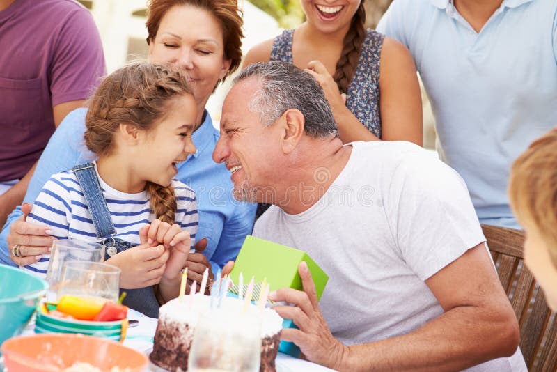 Multi Generation Family Celebrating Birthday in Garden Stock Image ...