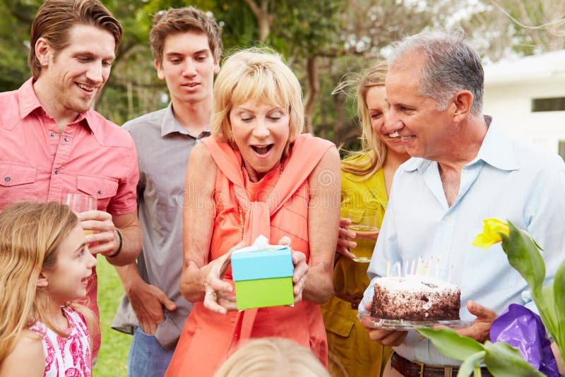 Multi Generation Family Celebrating Birthday in Garden Stock Image ...