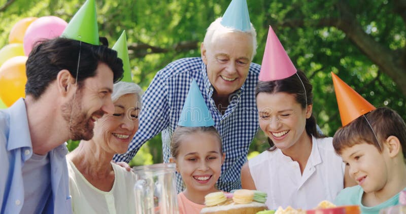 Multi-generation Family Celebrating Birthday Party Stock Footage ...