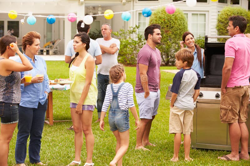 Multi Generation Family Enjoying Party in Garden Together Stock Photo ...
