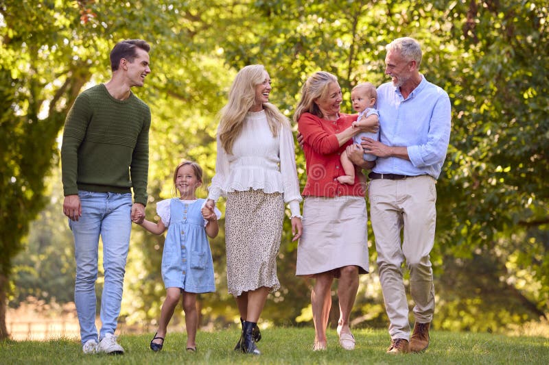 Multi-Generation Family Enjoying Walk in Countryside Together Stock ...
