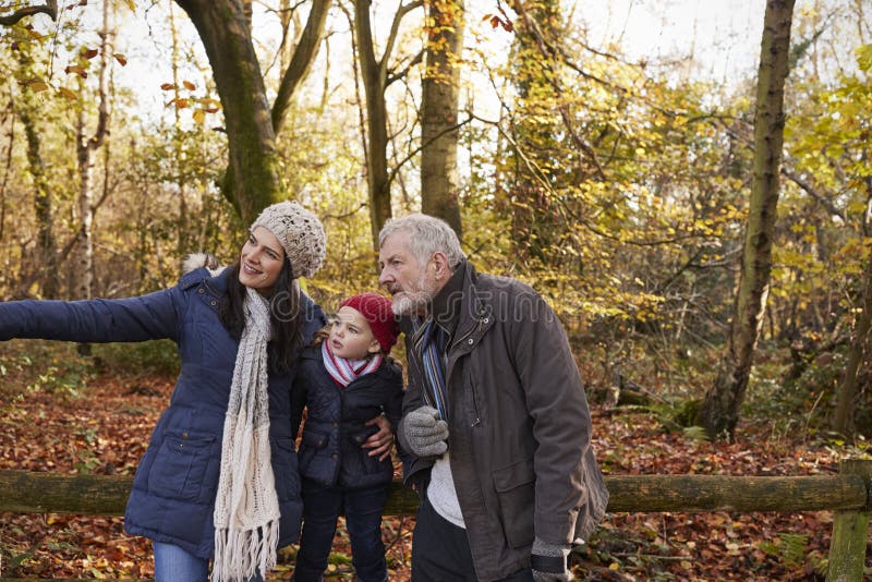 Multi Generation Family Enjoying Walk in Fall Landscape Stock Photo ...