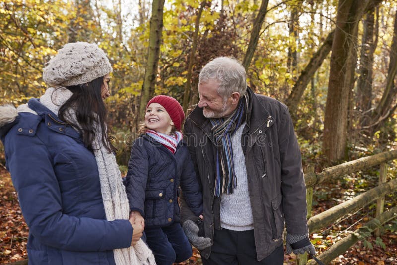 Multi Generation Family Enjoying Walk in Fall Landscape Stock Image ...
