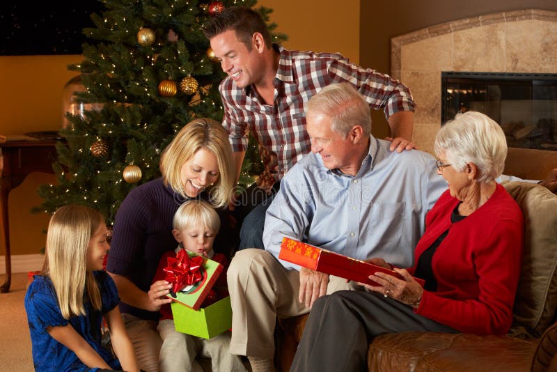 Multi Generation Family Opening Christmas Presents Stock Photo - Image ...