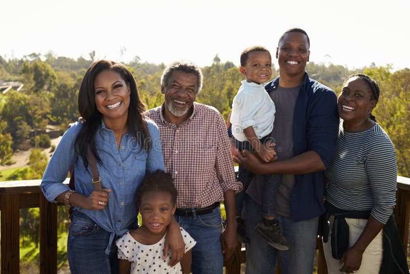 Multi Generation Family Standing On Outdoor Observation Deck Stock ...