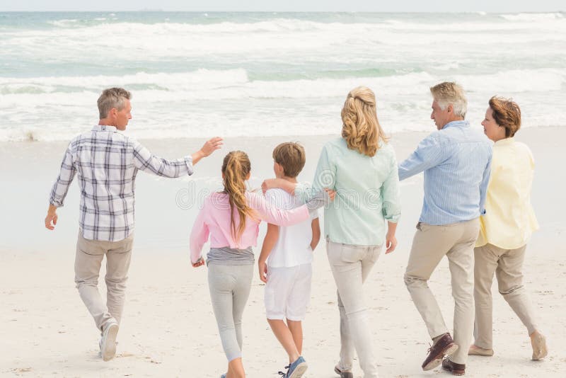 Multi Generation Family Walking by the Shore Stock Photo - Image of ...