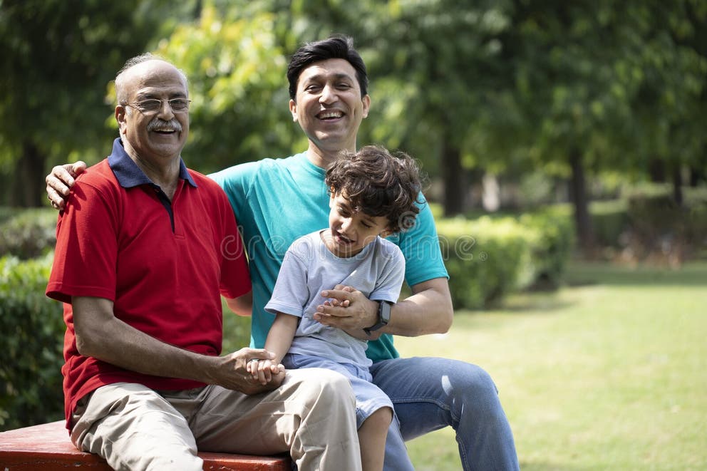 Multi Generation Male Smiling while Posing for Camera Stock Image ...