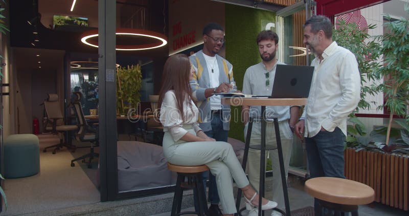 Multi Generational, Creative, Business Teammates Gathered at Table ...